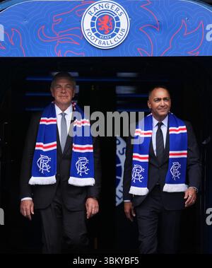 Rangers chairman Andrew Cavenagh (left) watches on during a training ...