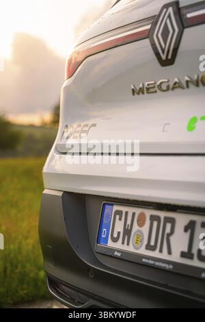 Rear view of a black Renault Megane Classic car parked on a white ...