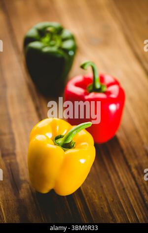 Multi-colored bell pepper on multicolored background Stock Photo - Alamy