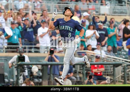 Seattle Mariners' Dominic Canzone celebrates after hitting a single ...