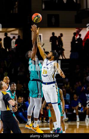Edmonton Stinger (25) Keon Ambrose-Hylton hangs ten after the slam dunk in action during the ...