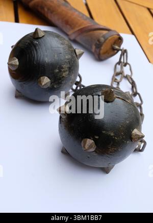 Decorative medieval weapon or Morgenstern mace with spikes lies on ...