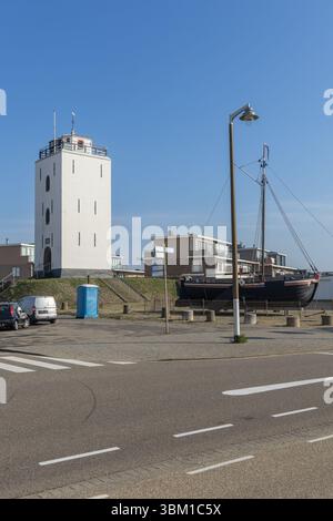 Historical white lighthouse in Katwijk aan Zee in South Holland, on the ...