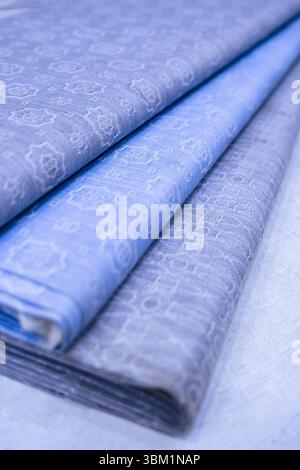 Close up view of neatly folded stack of birch firewood in corner of ...