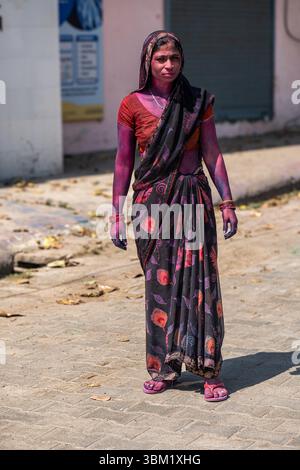 India, Rajasthan, 22 Mar 2025. Young man with sunglasses covered in ...
