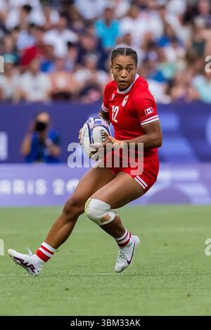 Canada back KEYARA WARDLEY (CAN) (12) competes in the Women's Rugby ...