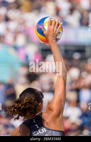 Anastasija Samoilova of Latvia serves against Kristen Nuss and Taryn ...