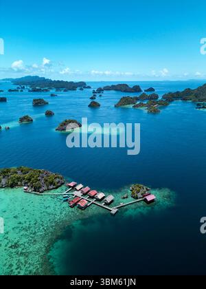 Aerial photo of an overwater homestay in Raja Ampat, Misool Stock Photo ...