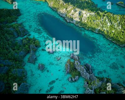 Karst islands and kayaks, inner archipelago, Misool, Raja Ampat ...