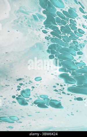 Black marble with turquoise spots Stock Photo - Alamy