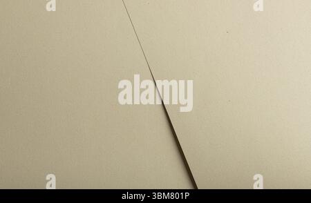 Beige and green recycled designer paper backdrop. Muted, speckled ...