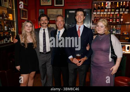 Nigel Farage with his daughters Isabelle and Victoria, his sons Tom and ...