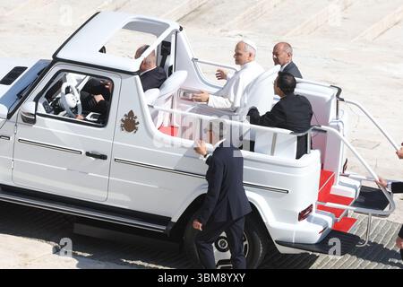 Pope Leo greets the faithful, before taking off by helicopter , at the ...