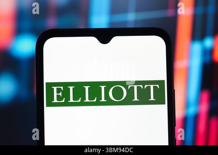 In this photo illustration, an Elliott Management Corporation logo is ...