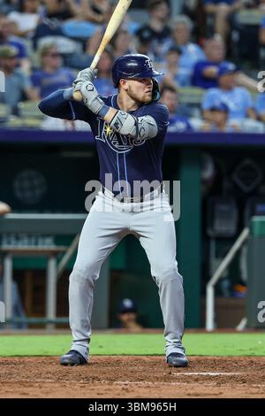 Tampa Bay Rays' Curtis Mead watches the flight of the ball after ...