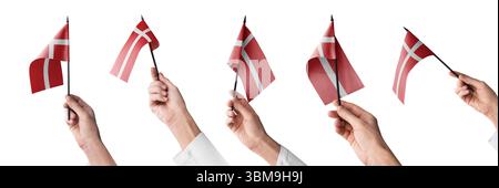 Denmark flag in hand. Patriotic background. National flag of Denmark ...
