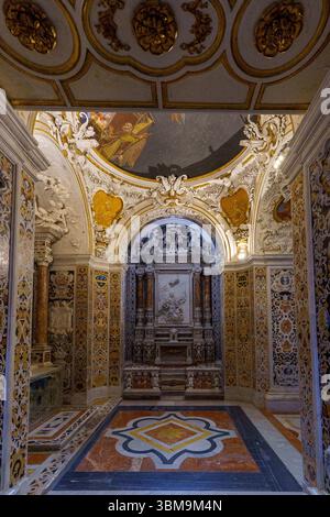 An ornate church interior featuring richly decorated tilework, gilded ...