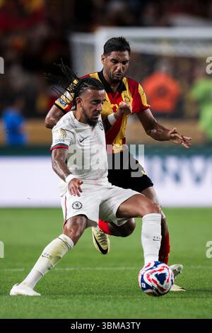 Malo Gusto of Chelsea FC competes for the ball with Khalil Guenichi of ...