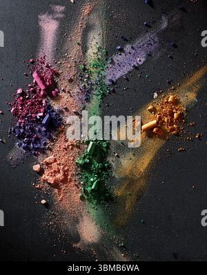 Green yellow dust particles explosion on black background. Powder dust ...