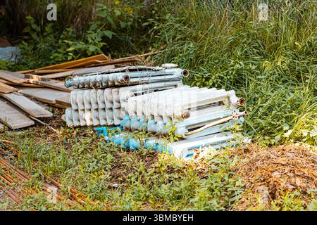 old cast iron batteries lie on the ground. High quality photo Stock ...