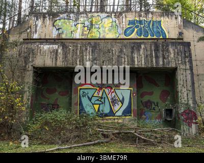 Graffitied closed entrance to a former missile bunker on the Grosser ...