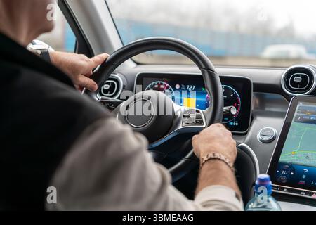 Driving scenery with driver inside a modern car Stock Photo - Alamy