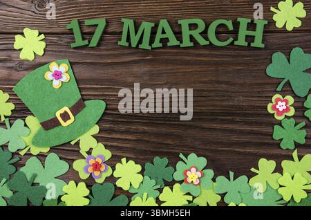 Happy Saint Patrick's mockup of handmade felt hat and shamrock clover ...