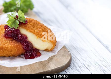 Fresh made Fried Camembert (selective focus) on wooden background Stock ...