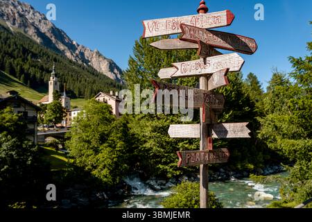 Traditional Alpine Village of Splugen with Colorful Houses and Church ...