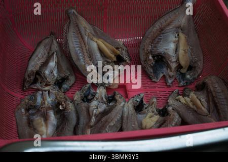 Preserved fish, a common sight in local markets. Dried fish ...