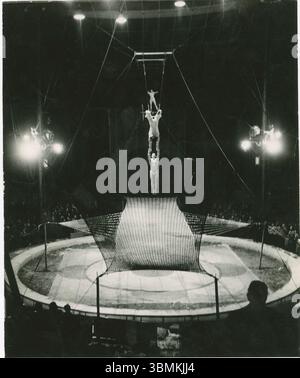 Circus Performers on Trapeze Stock Photo - Alamy