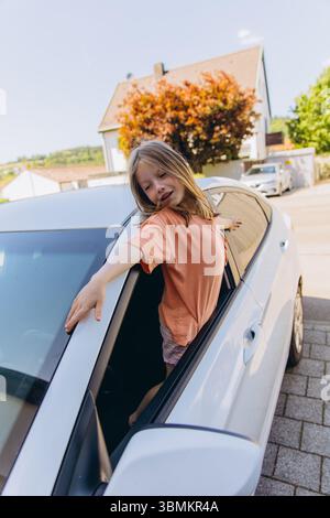 Dreams of travel. Child flying on jetpack with toy airplane on sky ...