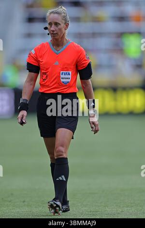 Referee Tori Penso, of the United States, speaks to Czechia's Vladimir ...