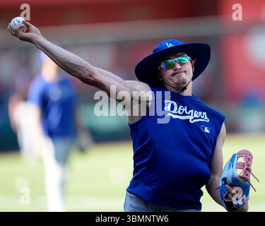 Max Muncy #13 of the Los Angeles Dodgers swings the bat during a game ...