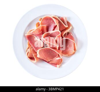 Spanish jamon cut, parma ham cutting in a plate isolated on white ...
