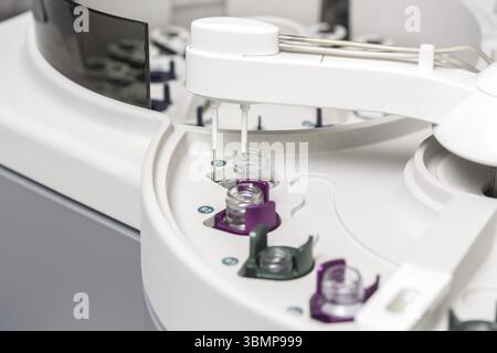 Small tube to machine in laboratory Stock Photo - Alamy