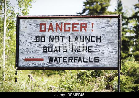 A danger do not launch boats sign Stock Photo - Alamy