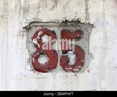 Vintage grunge square metal rusty plate of number of street address ...