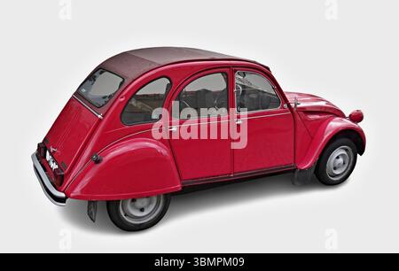 Classic red Citroen 2CV car parked on a white background Stock Photo ...