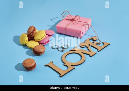 Macaroons on a blue background with the words I love spelt out i Stock ...