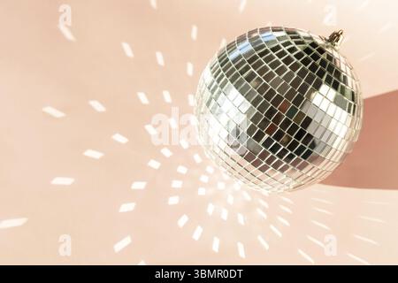 disco ball on sand background with corals. party, disco concept ...