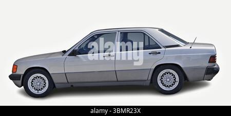 Classic Mercedes-Benz 190E sedan posing in a studio with white ...