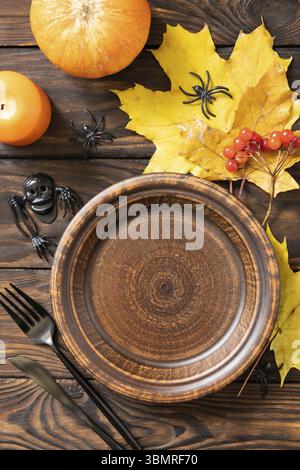 Top view of blank halloween plate on a stone table. Halloween table ...
