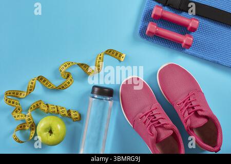 Dumbbell in green color, water bottle, measure tape, towel, fruit Stock ...