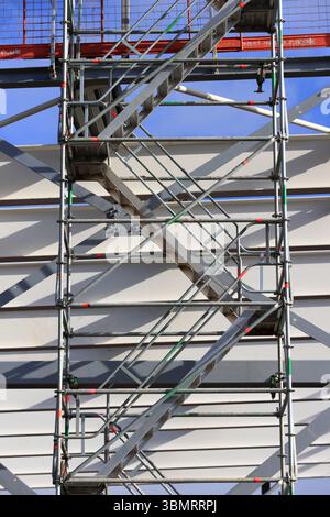 Radcliffe civic hub development, steel skeleton frame, with orange high visibility edge ...