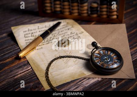 An envelope rests on a dark surface, containing a message about growth ...