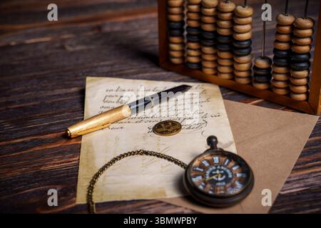 An envelope rests on a dark surface, containing a message about growth ...