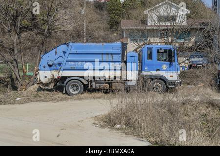 Dirt path next to a country house on a foggy day in autumn Stock Photo ...