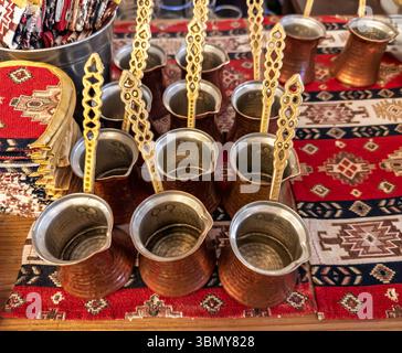 Balkan cezve for turkish coffee. A copper cezve on black surface ...
