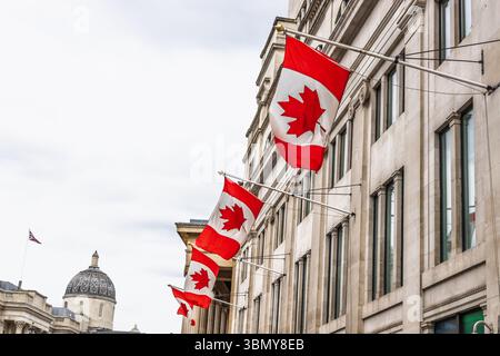Canadian flags line a street in High River, Alta., Wednesday, May 7 ...